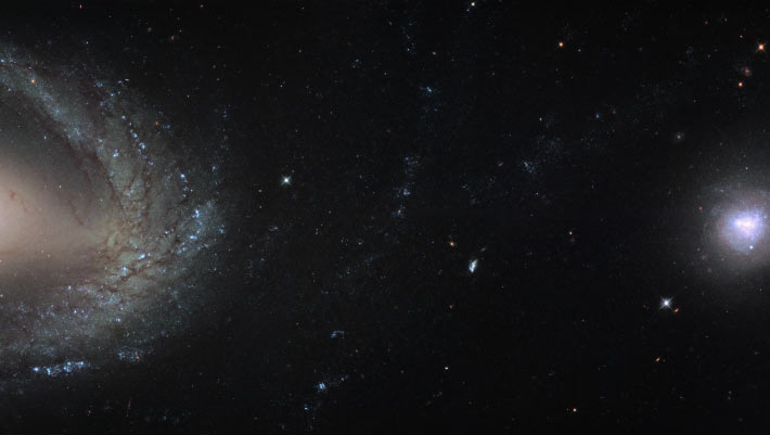 Hubble Spies Cosmic ‘David and Goliath’ in Gravitational Dance | Sci.News