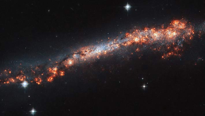 Hubble Space Telescope Sees NGC 3432: Edge-On and Distorted | Astronomy ...