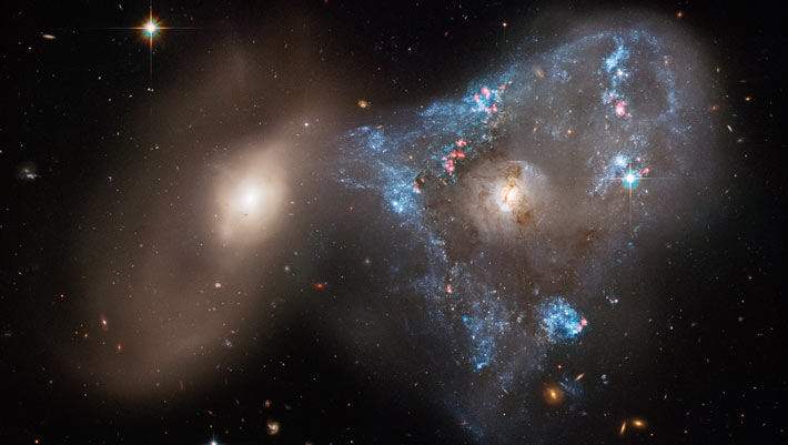 Head-On Galaxy Collision Creates Tsunami of Starbirth | Sci.News