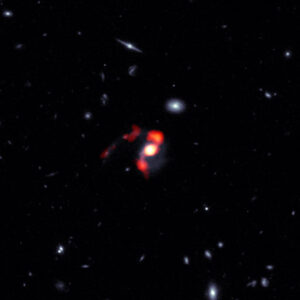 Massive Galaxy Strips Star-Forming Gas from Smaller Galaxy during ...