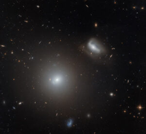 Hubble Focuses on Pair of Galaxies in Abell 1185 | Sci.News